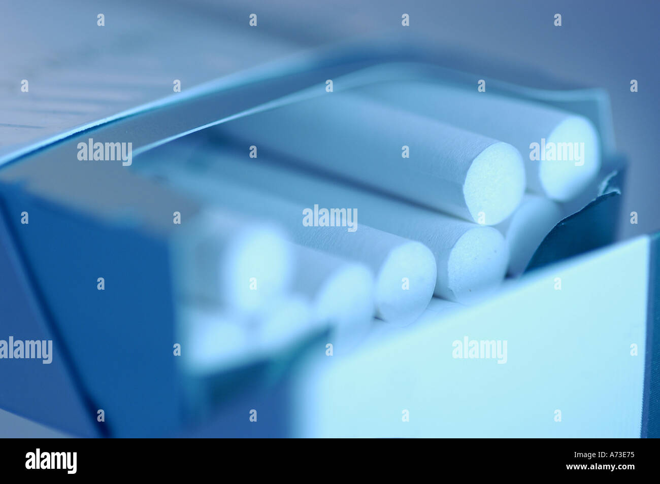 White cigarettes in box diagonal view blue Stock Photo - Alamy