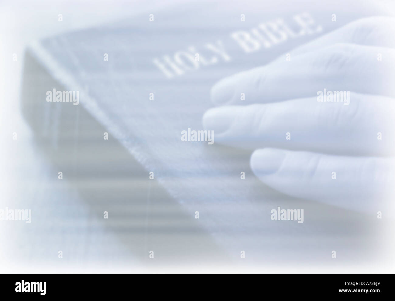 Hand on bible hi-res stock photography and images - Alamy