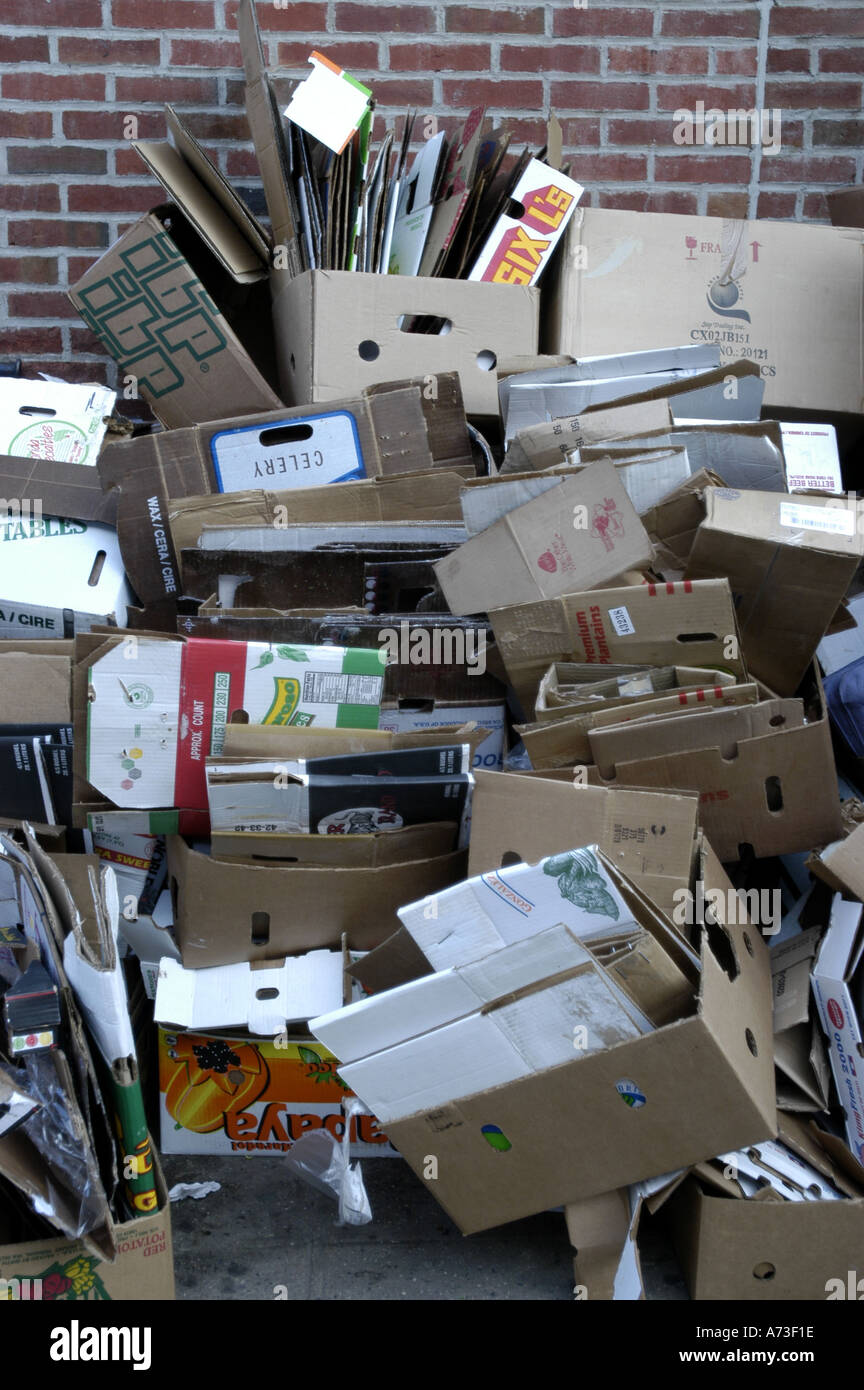 Recycling garbage rubbish waste green boxes cardboard paper vertical ...