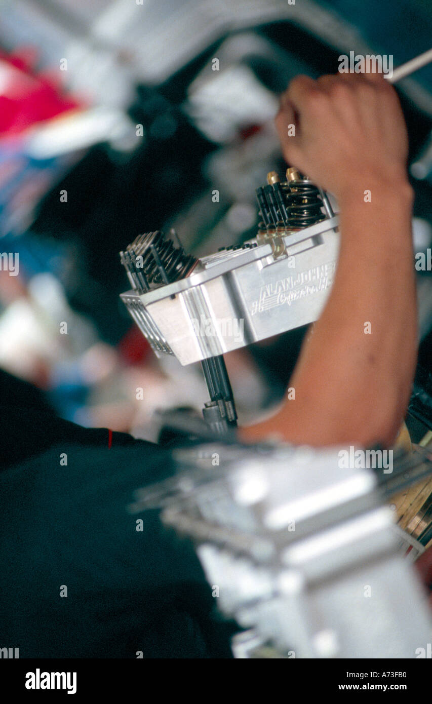 Drag racing engine being worked on by mechanic car engine repair ...