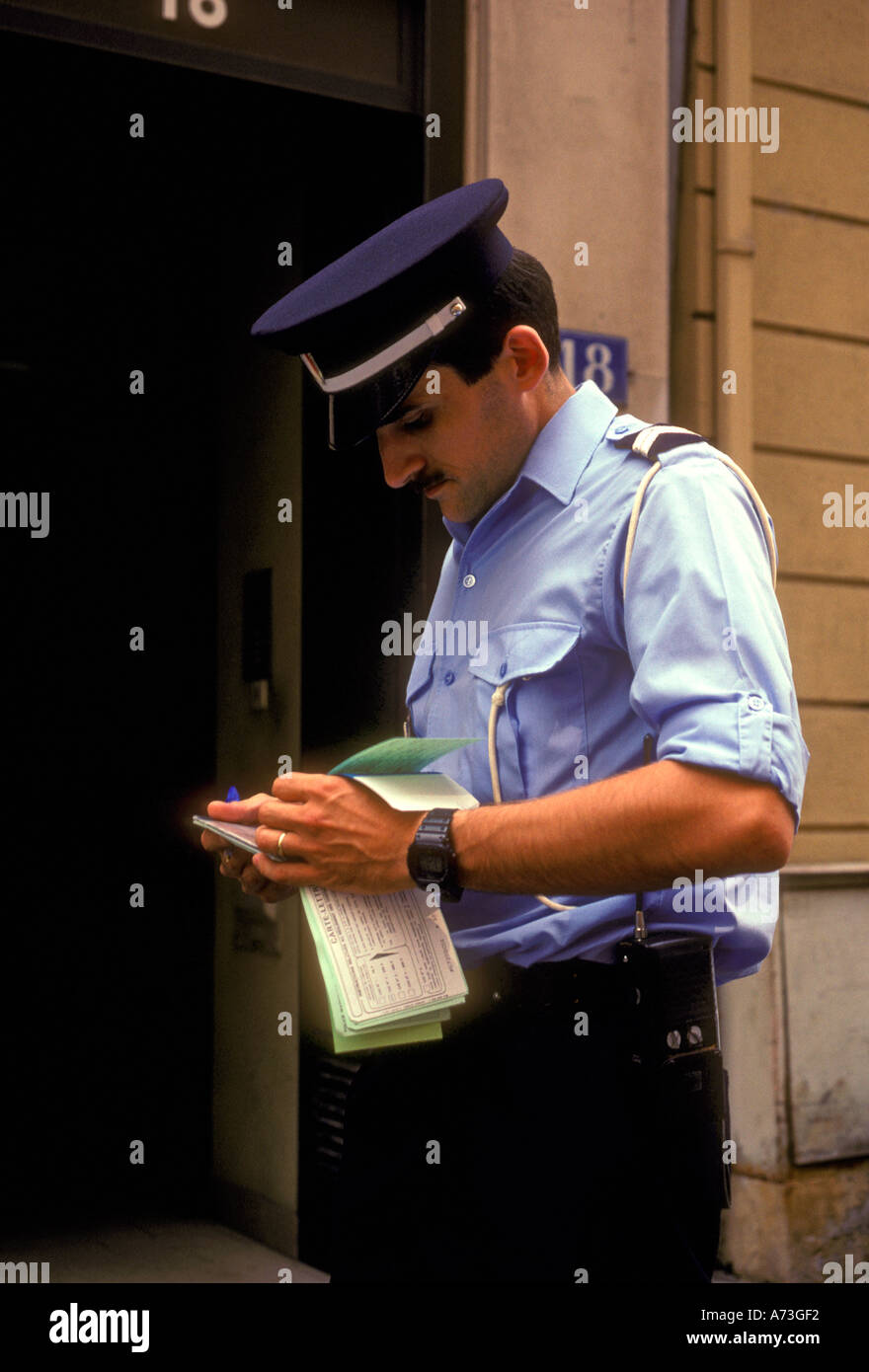 Policeman writing hi-res stock photography and images - Alamy