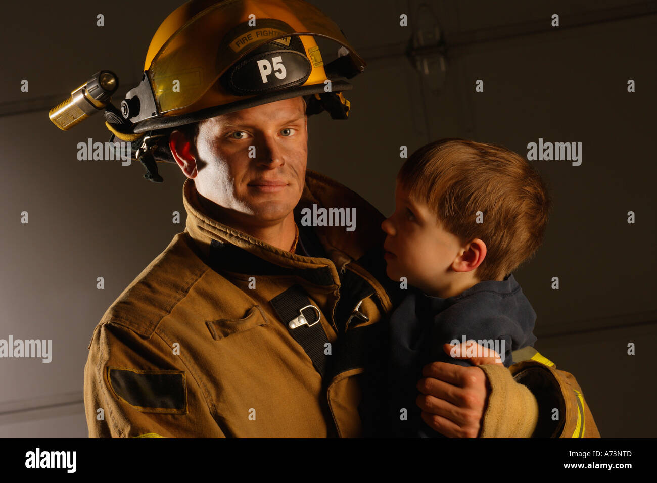 Fireman rescue child hi-res stock photography and images - Alamy