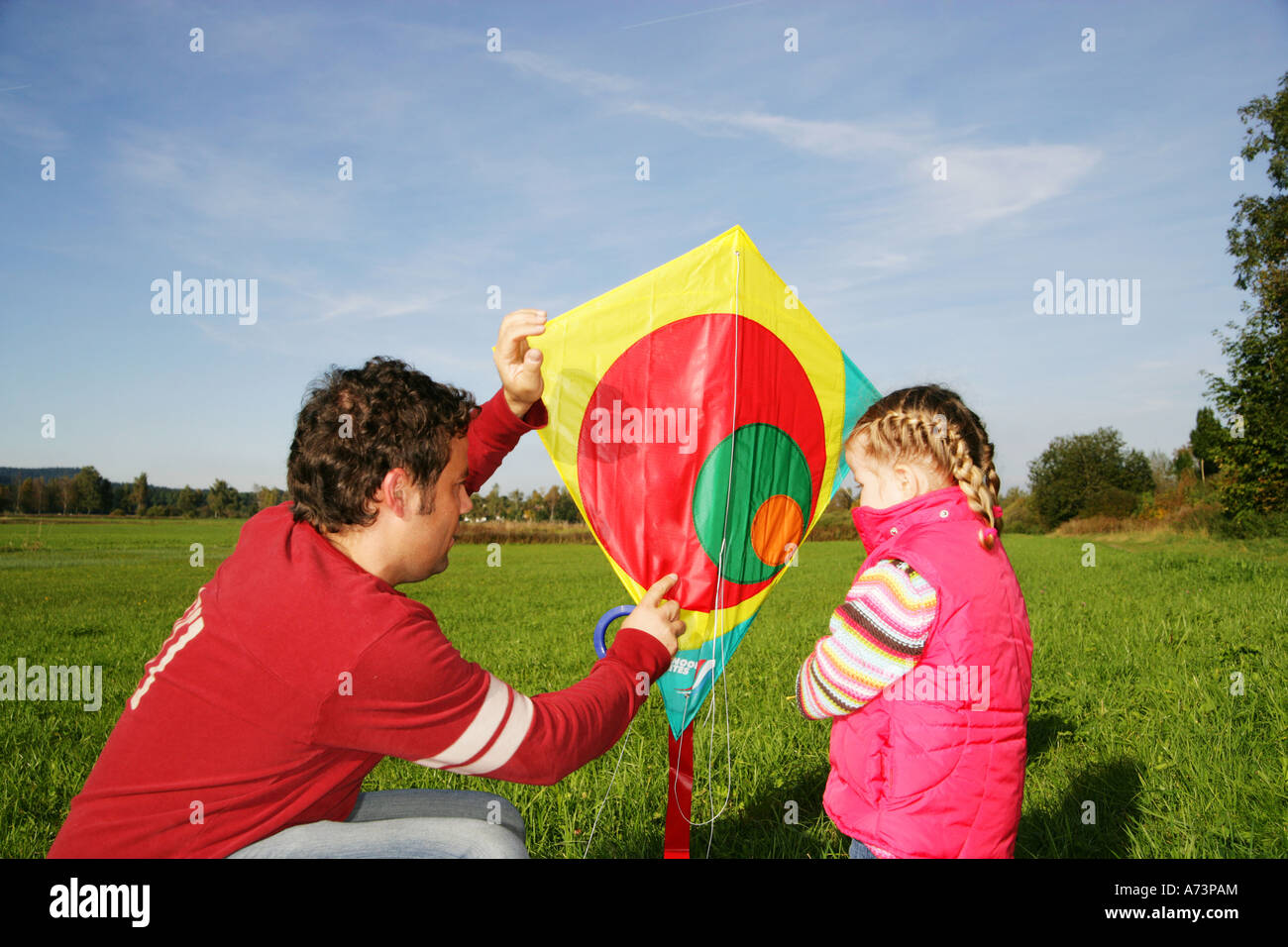 playing with kite Stock Photo - Alamy