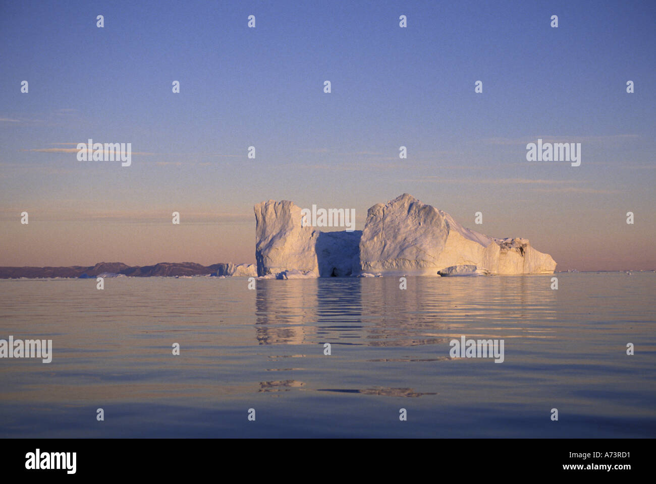 Greenland Iceberg calving Stock Photo - Alamy
