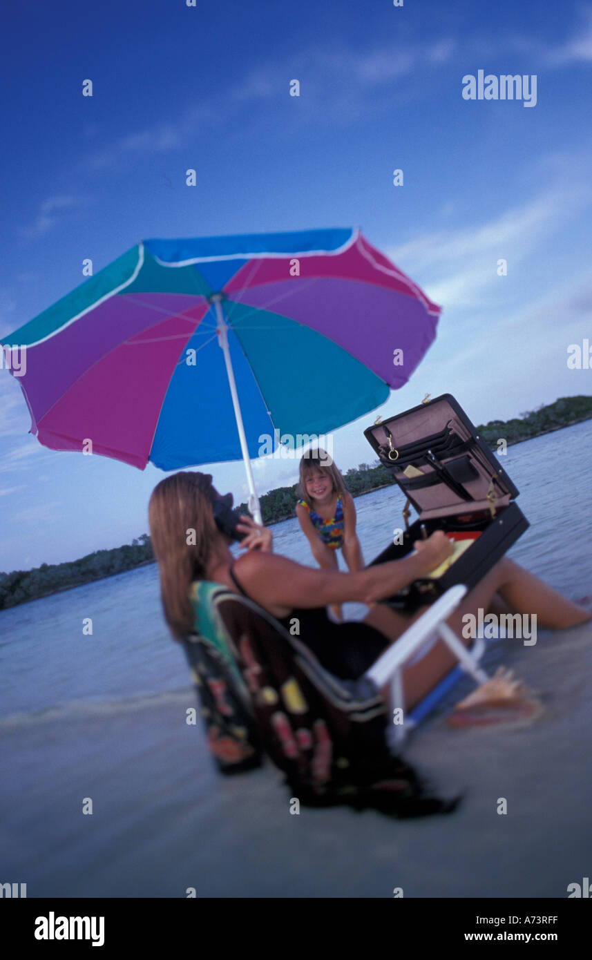 Family umbrella mobile phone hi-res stock photography and images - Alamy