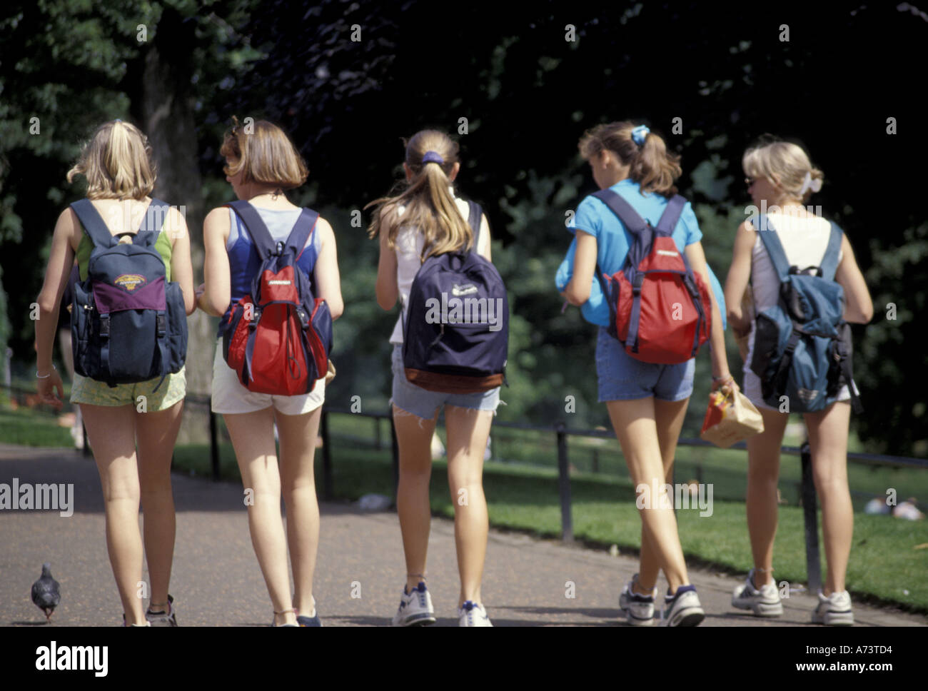 Group school children wearing backpacks hi-res stock photography and ...