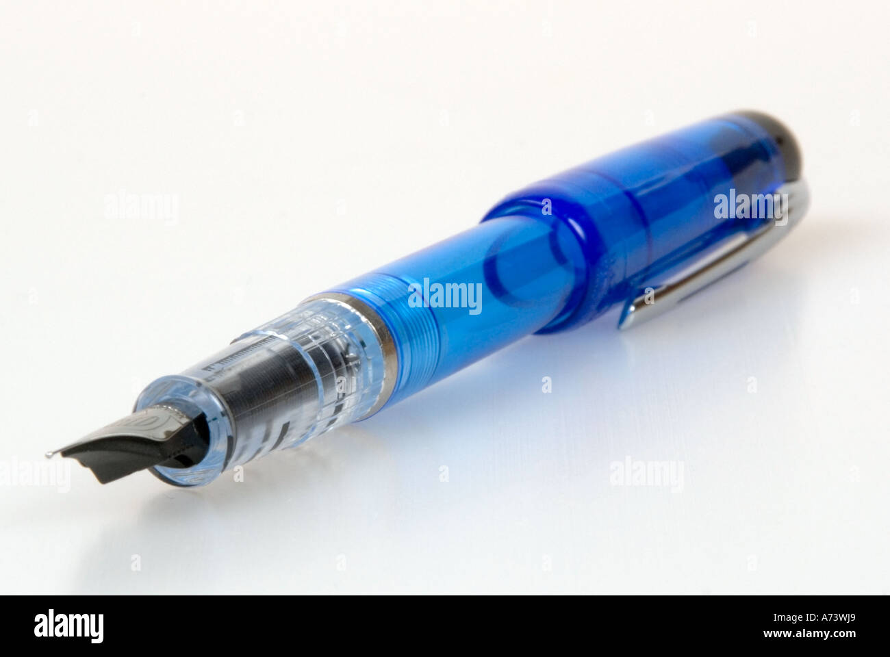 Translucent blue fountain pen against a white background Stock Photo ...