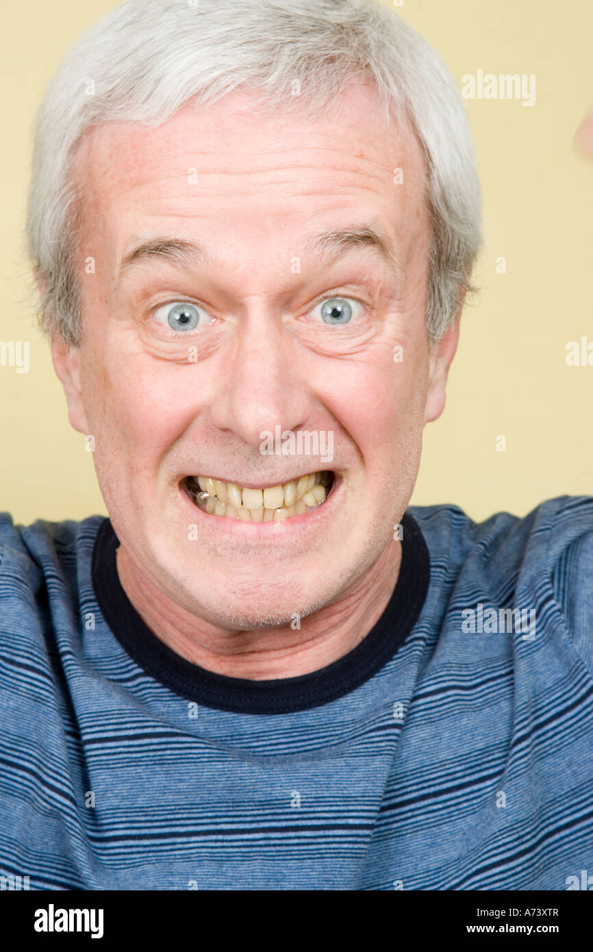 Portrait of Angry Grey Haired Man UK Stock Photo - Alamy