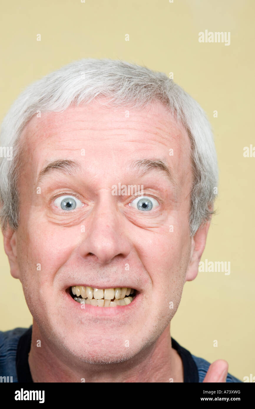 Portrait of Angry Grey Haired Man UK Stock Photo - Alamy