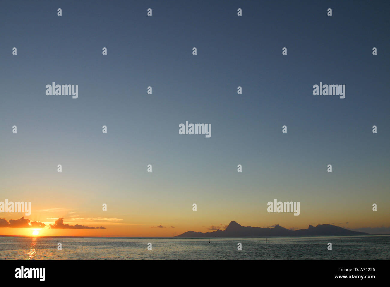 Sunset by Moorea French Polynesia Stock Photo - Alamy