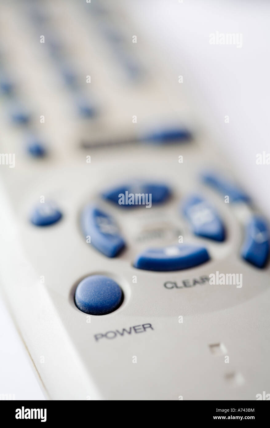 TV and video system remote control on white background. Focus on ...