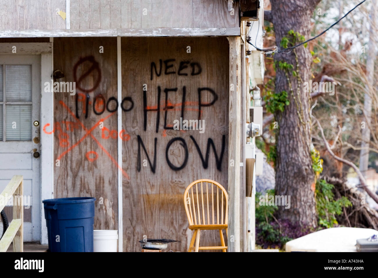 sign painted on side of house after hurricane Katrina need help now ...