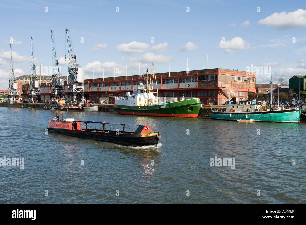 Narrowboat Redshank, other vessels and cranes in front of the Bristol ...