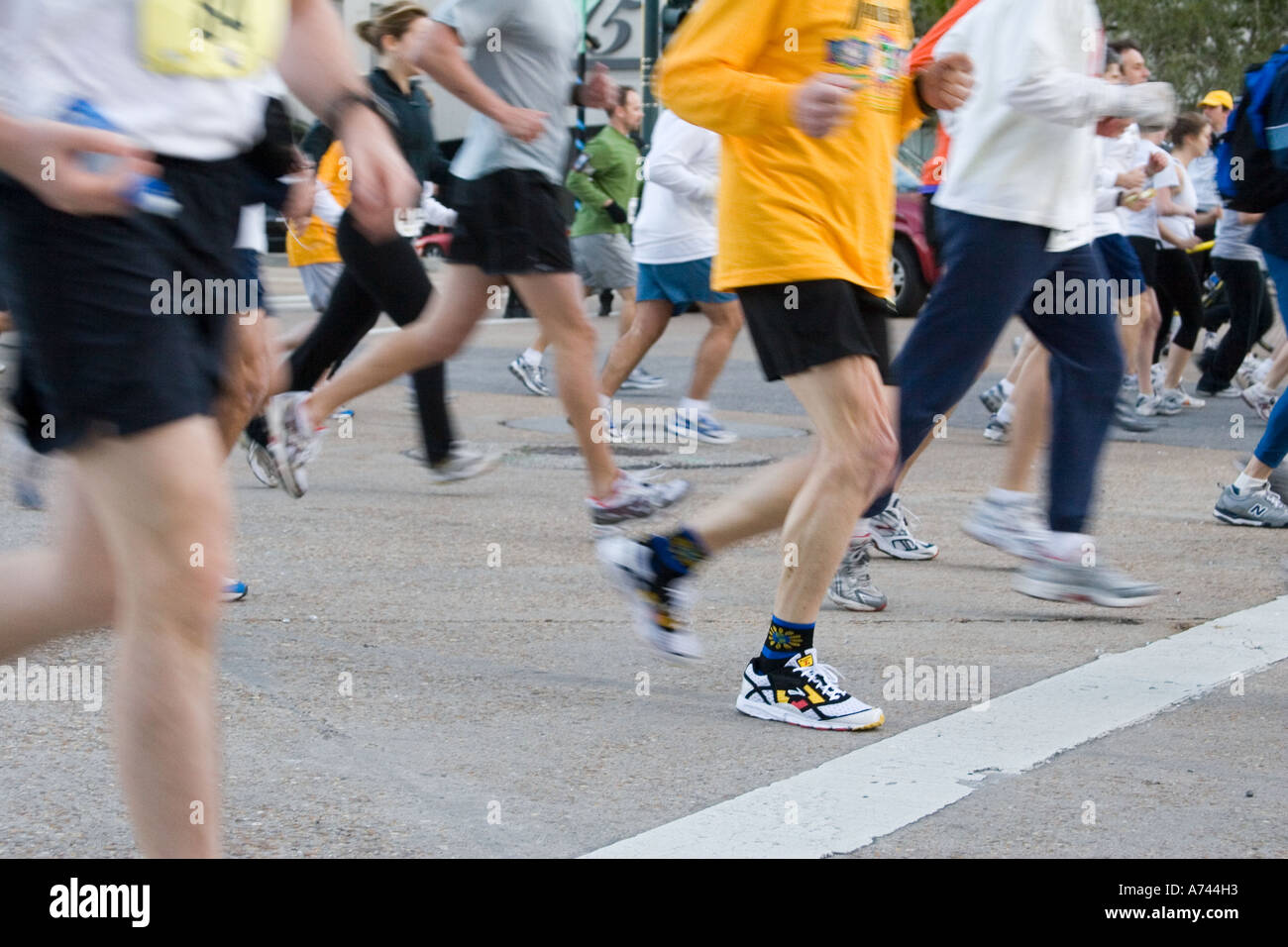 Runners on a race track at finish line hi-res stock photography and ...