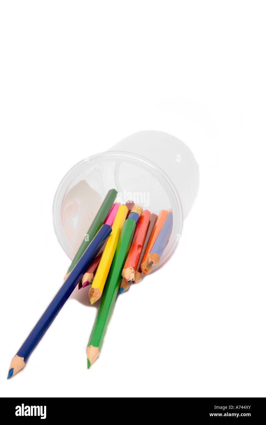 Coloured pencils in plastic pot holder Stock Photo - Alamy