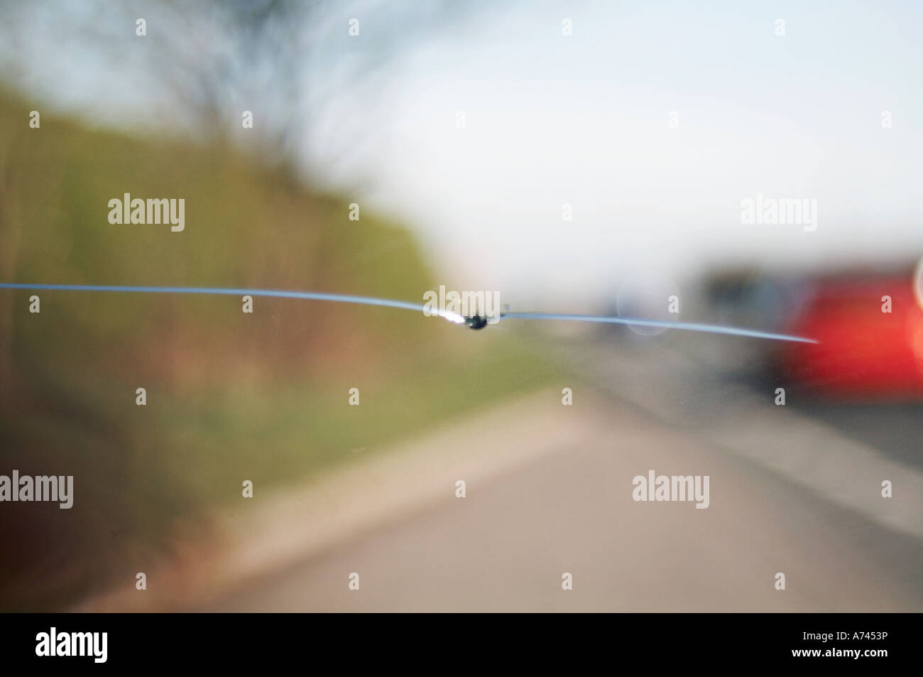 crack on car windscreen Stock Photo - Alamy