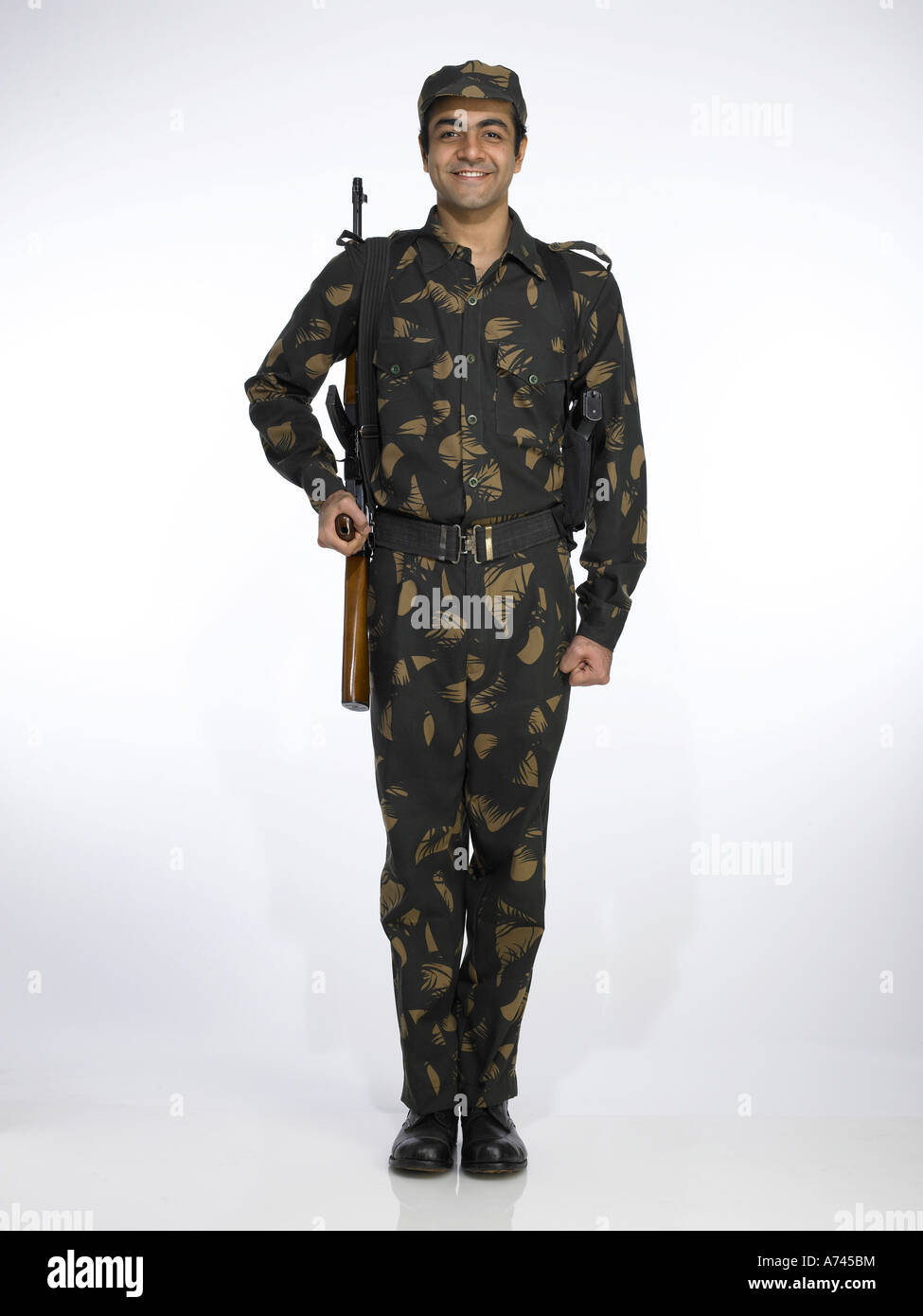 Soldier Standing At Attention With Gun