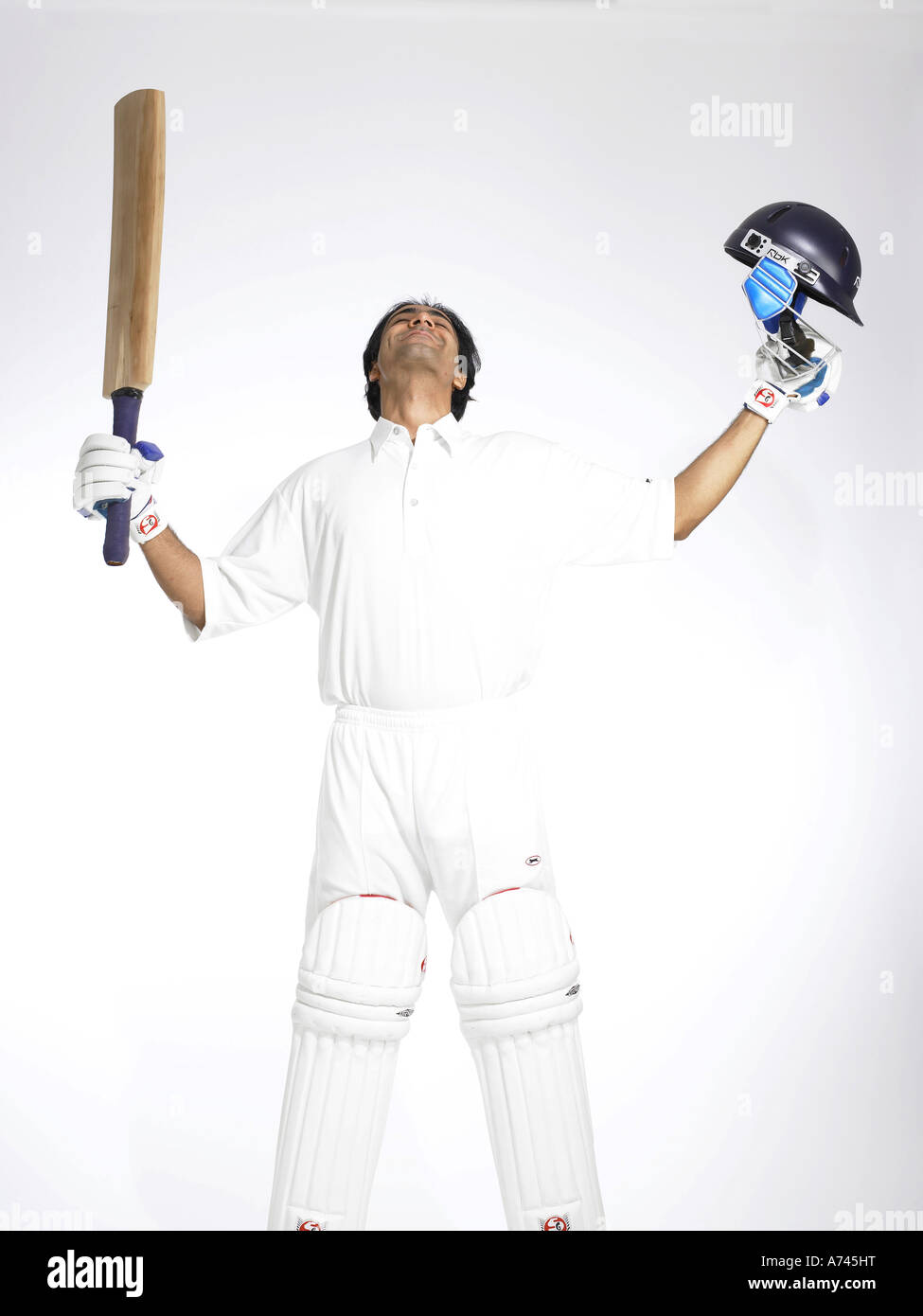 Cricket batsman raising bat hi-res stock photography and images - Alamy
