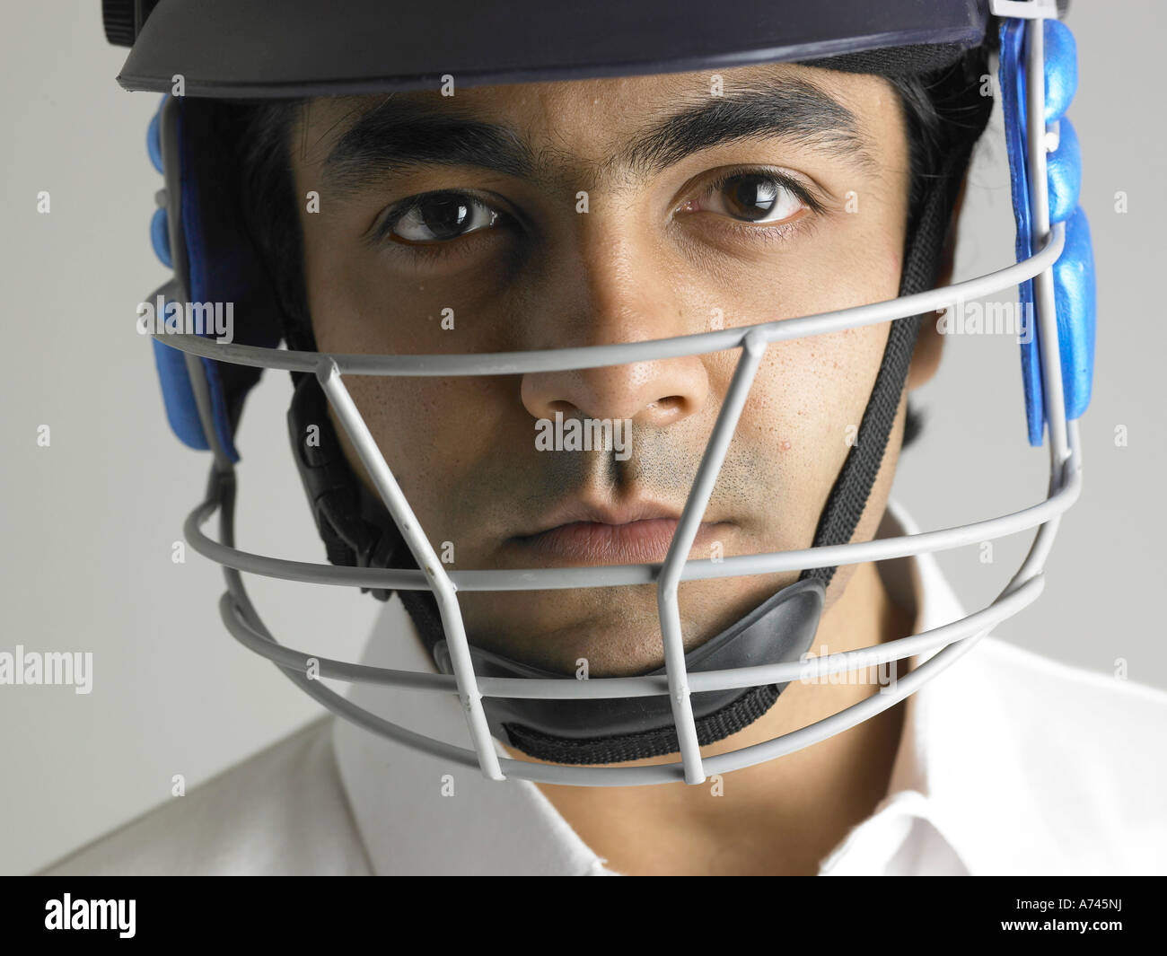 VDA 201811 Close ups of Indian batsman wearing helmet ready for cricket ...