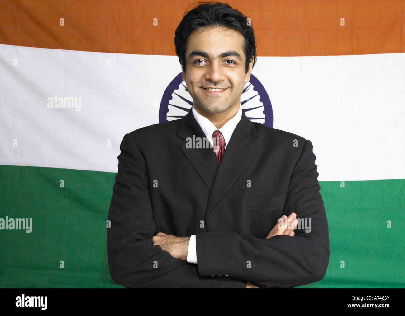 VDA 201916 South Asian Indian executive standing with cross hands pose ...