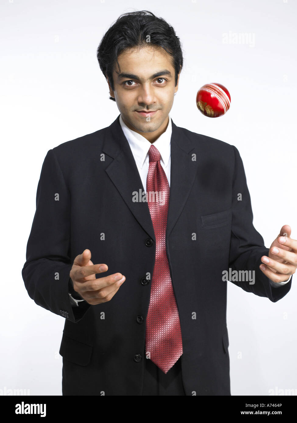 VDA 201922 South Asian Indian executive throwing maroon color cricket ...