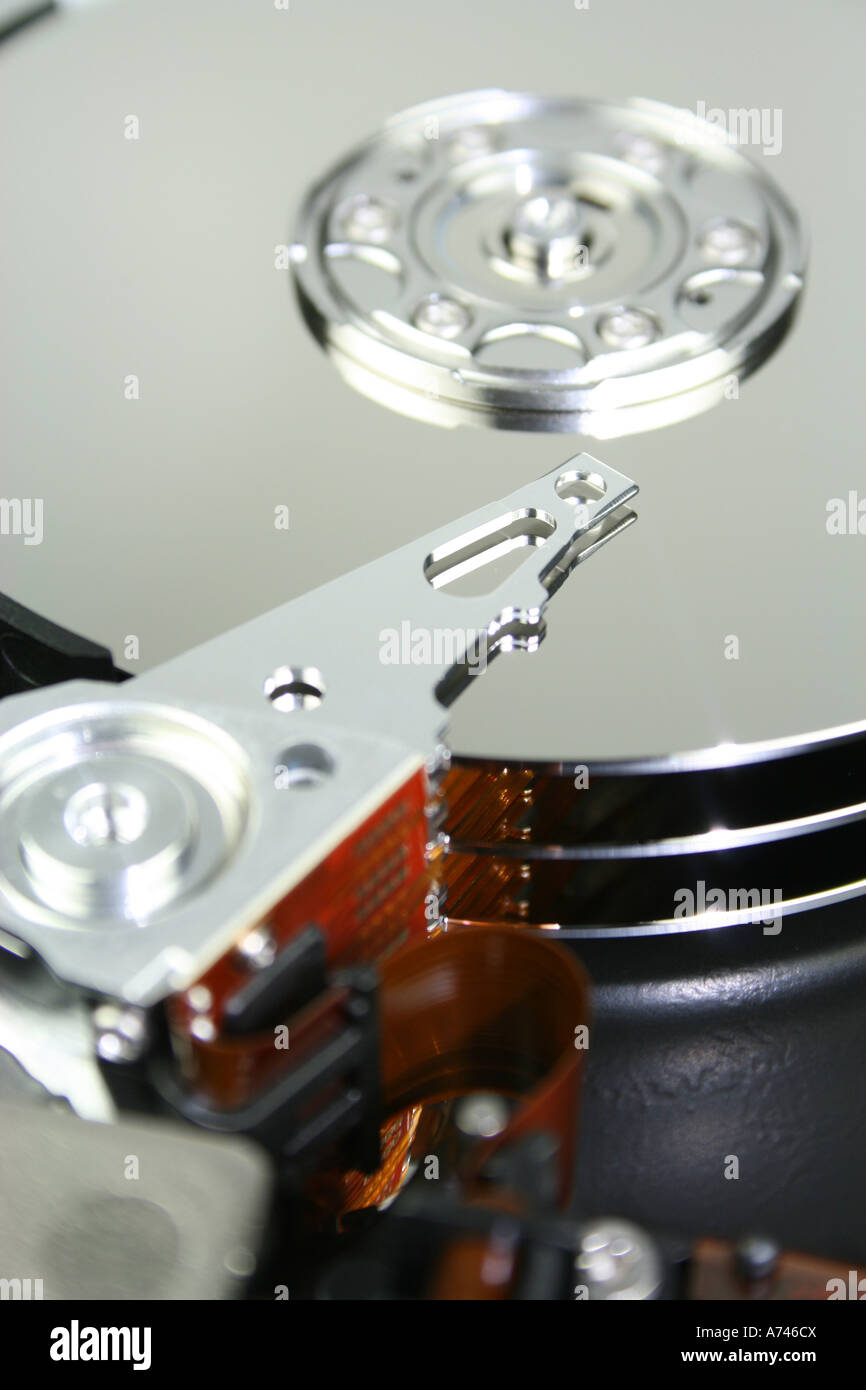 Inside of computer hard disc drive and read/write heads Stock Photo - Alamy