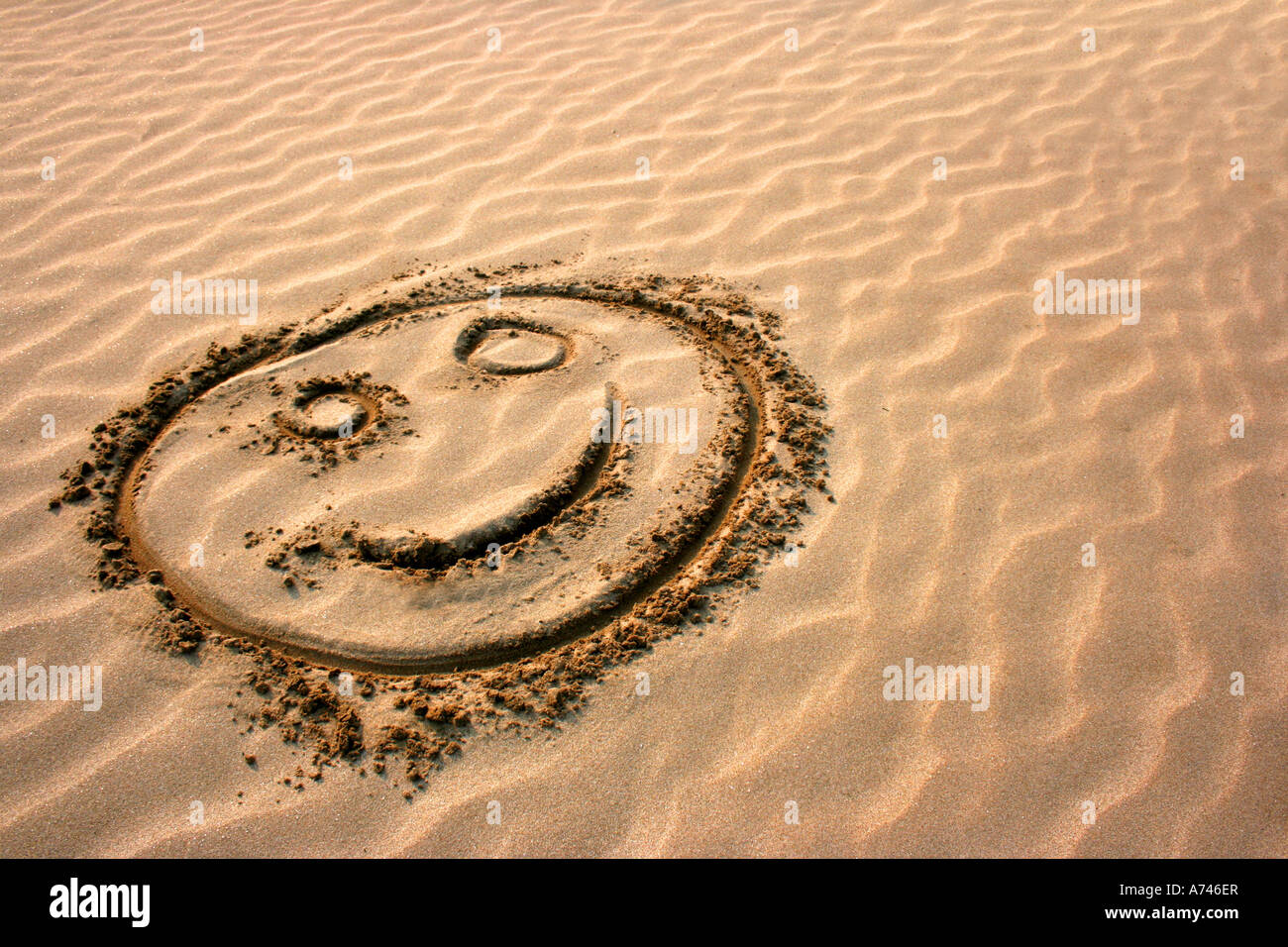 Smiley Face In Sand High Resolution Stock Photography and Images - Alamy