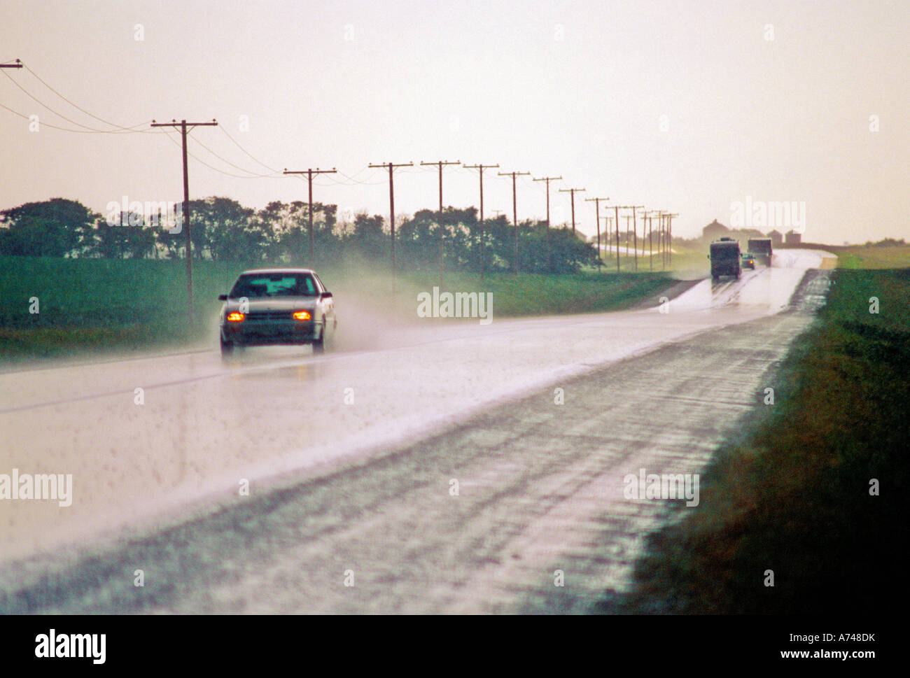 Rain on the highway Stock Photo - Alamy