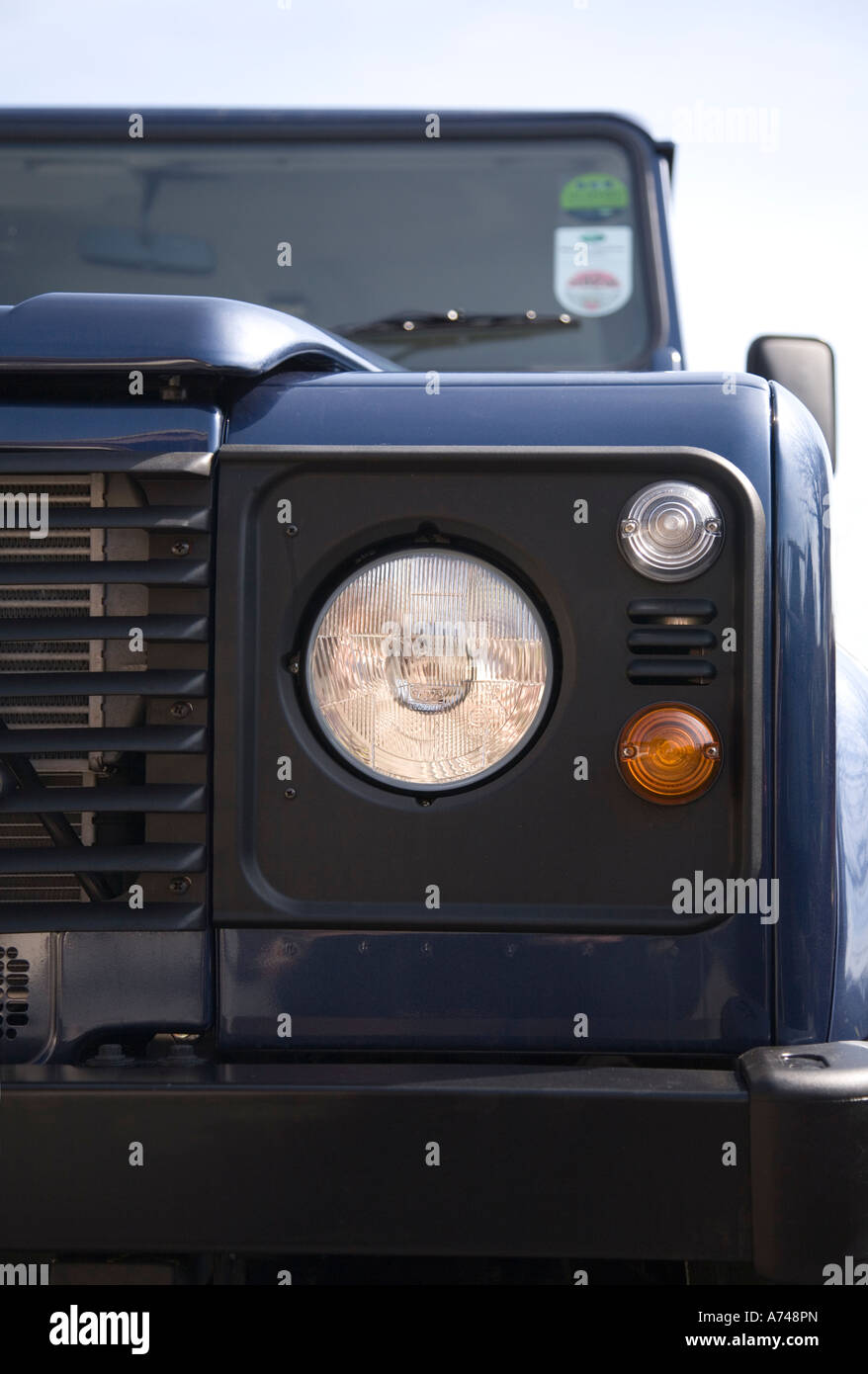 New Land Rover Defender TD5 motor vehicle. Front lights detail. UK ...
