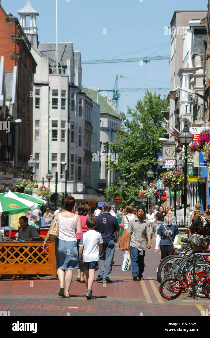 People walking through a pedestrianised zone in a busy Leicester city ...