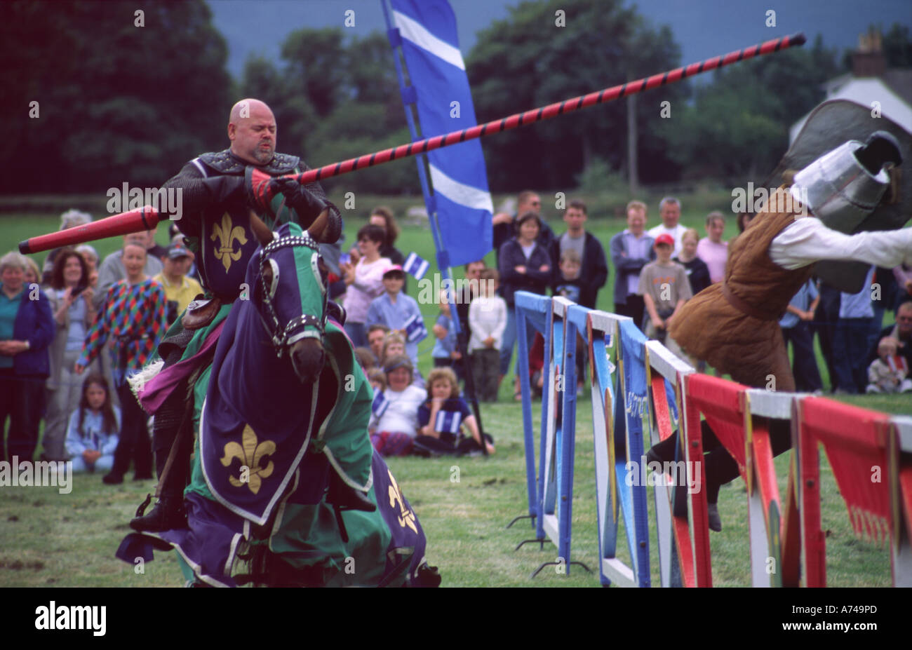 Fun and games knight jousting Stock Photo - Alamy