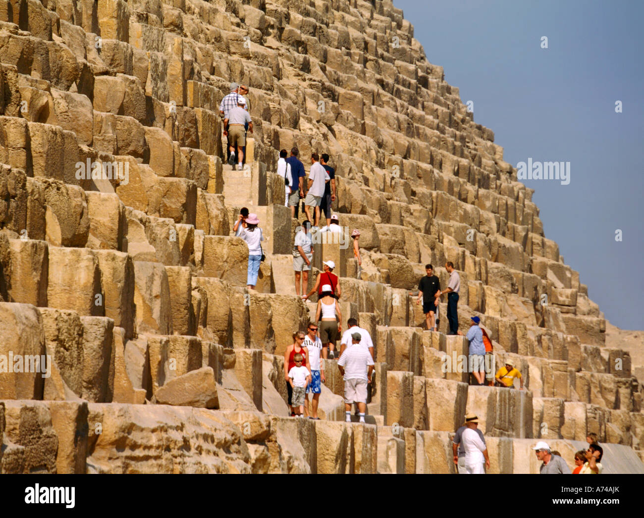 Tourists on Cheops Pyramid Egypt Stock Photo - Alamy