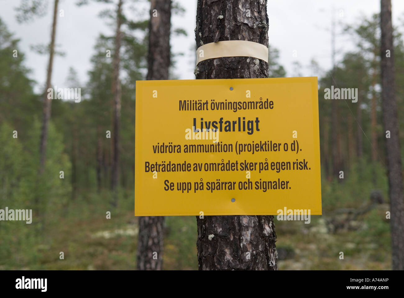 Sign, highly dangerous area Stock Photo - Alamy