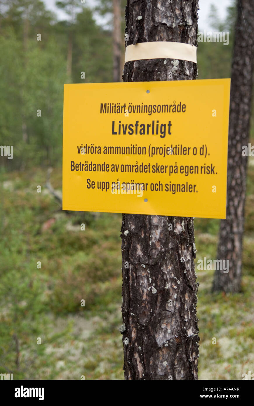 Sign, highly dangerous area Stock Photo - Alamy