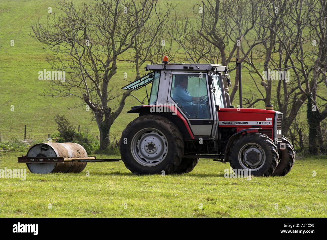 Tractor pulling roller hi-res stock photography and images - Alamy