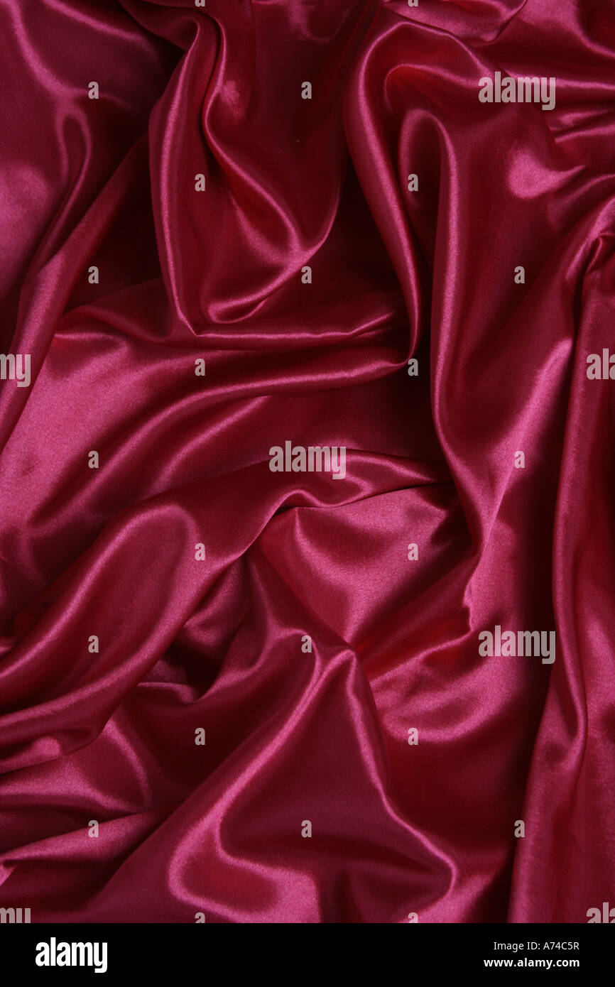 Red satin fabric background Stock Photo - Alamy