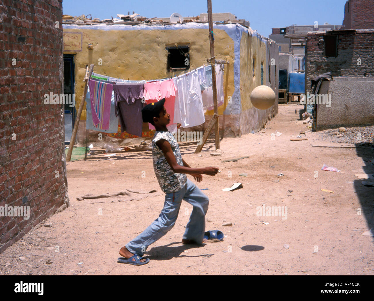Arabic children playing football hi-res stock photography and images ...