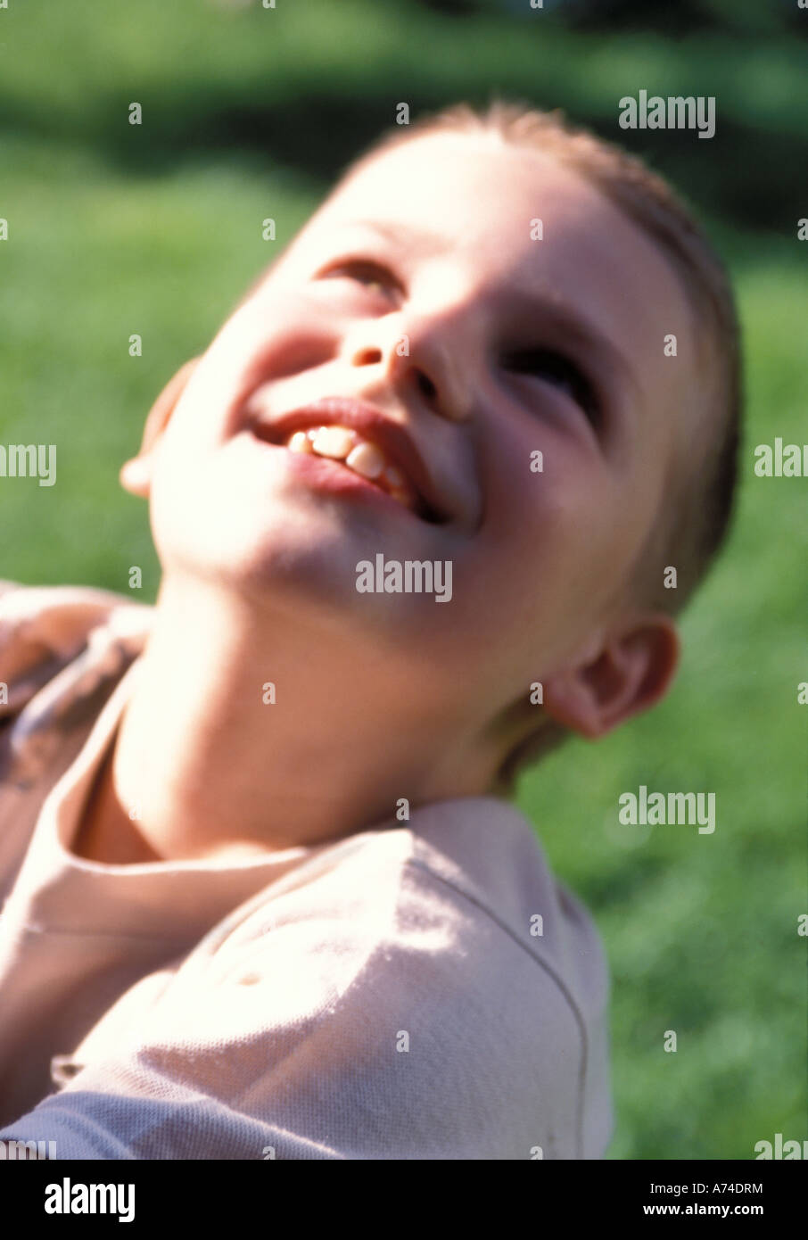 Boy looking up Stock Photo - Alamy