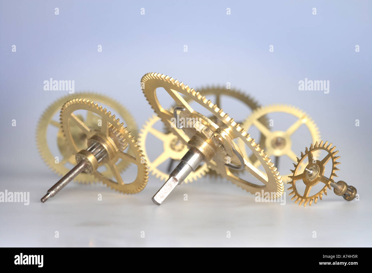 cogs from a clock Stock Photo - Alamy