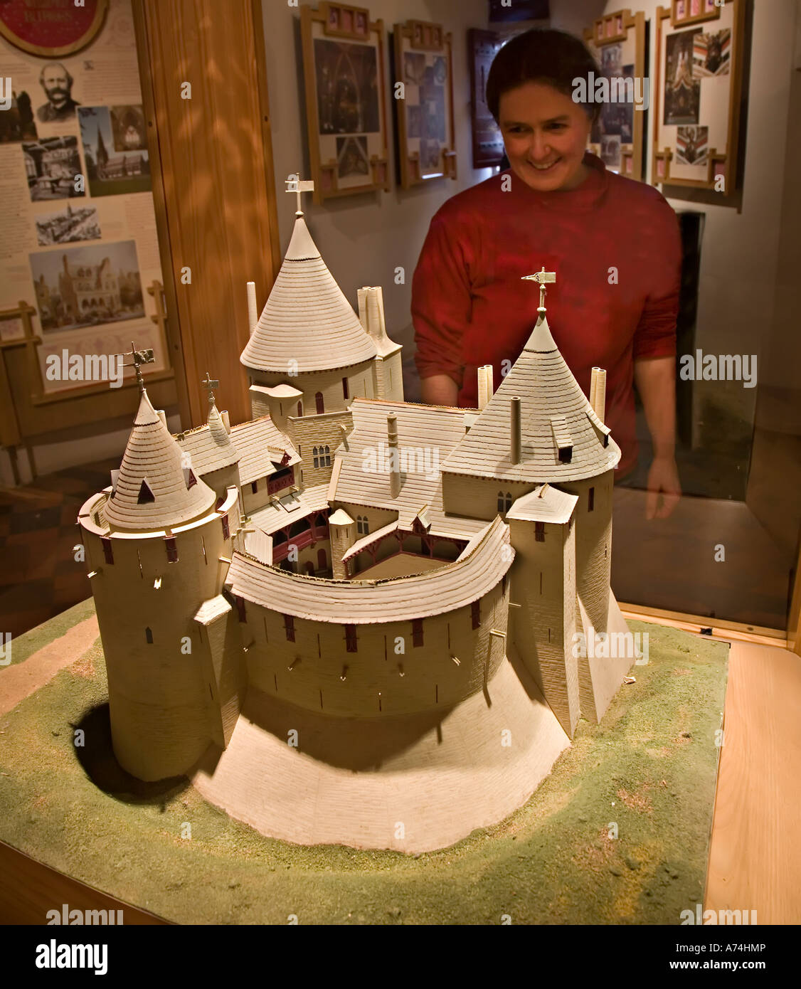 Woman tourist looking at a model of Castell Coch Wales UK Stock Photo ...