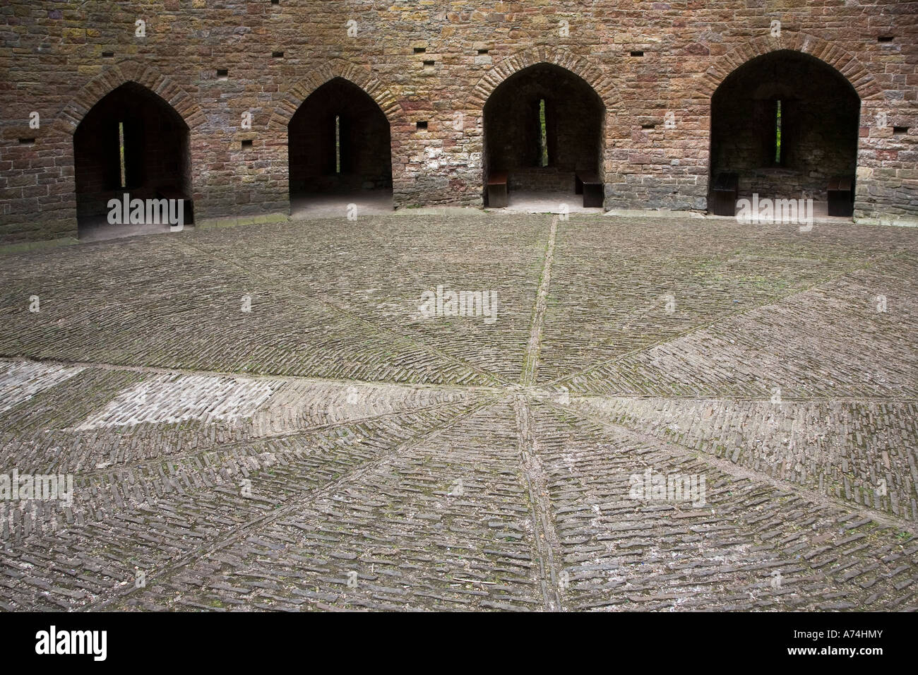 Geometric design of paved courtyard Castell Coch Wales UK Stock Photo ...