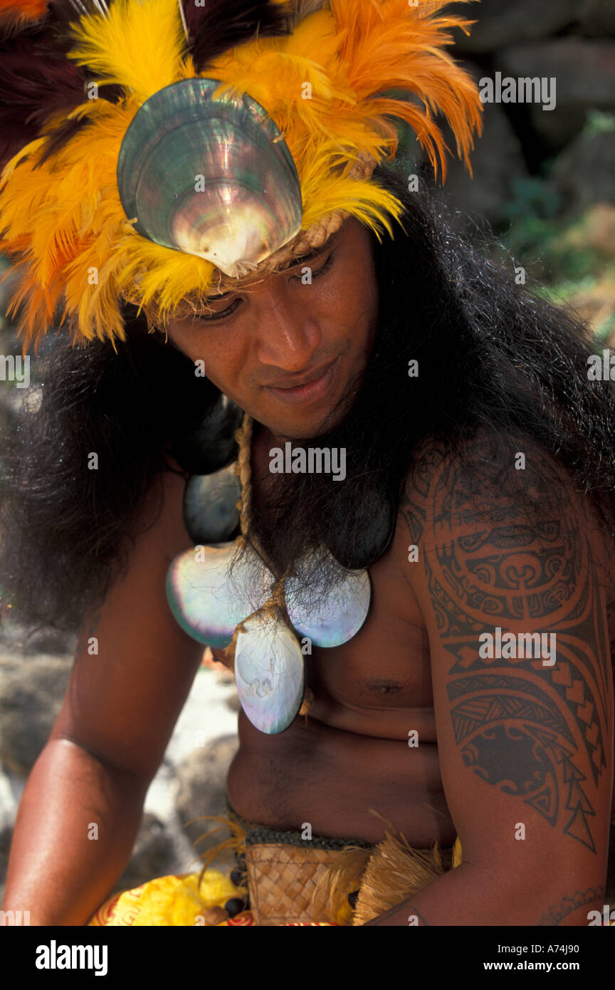French Polynesia, Moorea. Tiki Polynesian Village. Polynesian young guy ...