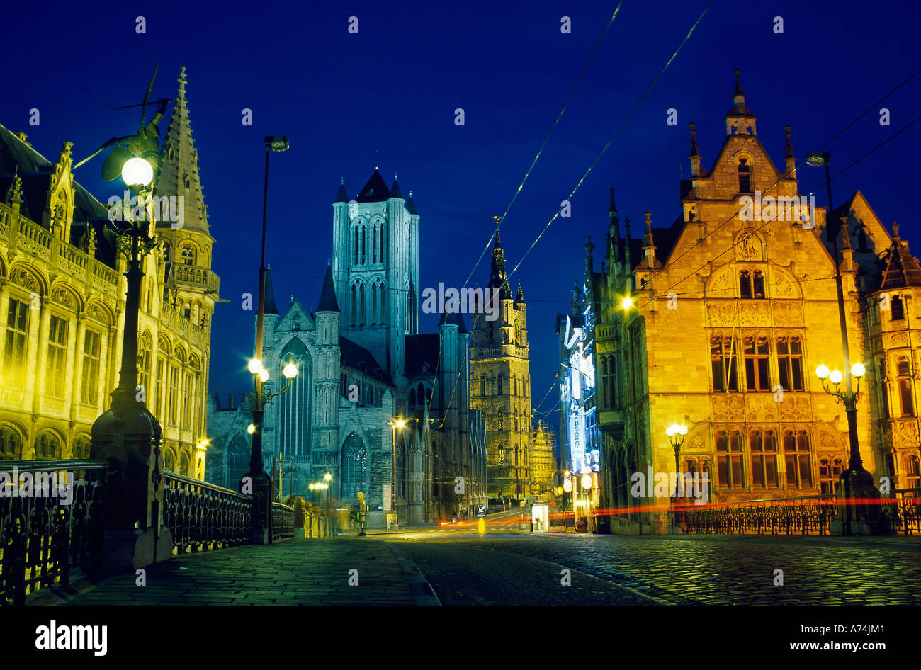 Medieval city centre Church cathedral houses Night Buildings lit up in ...