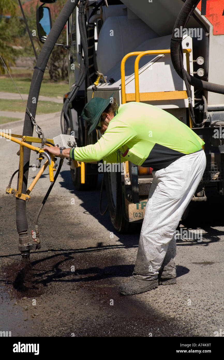 worker repairing a road Stock Photo - Alamy