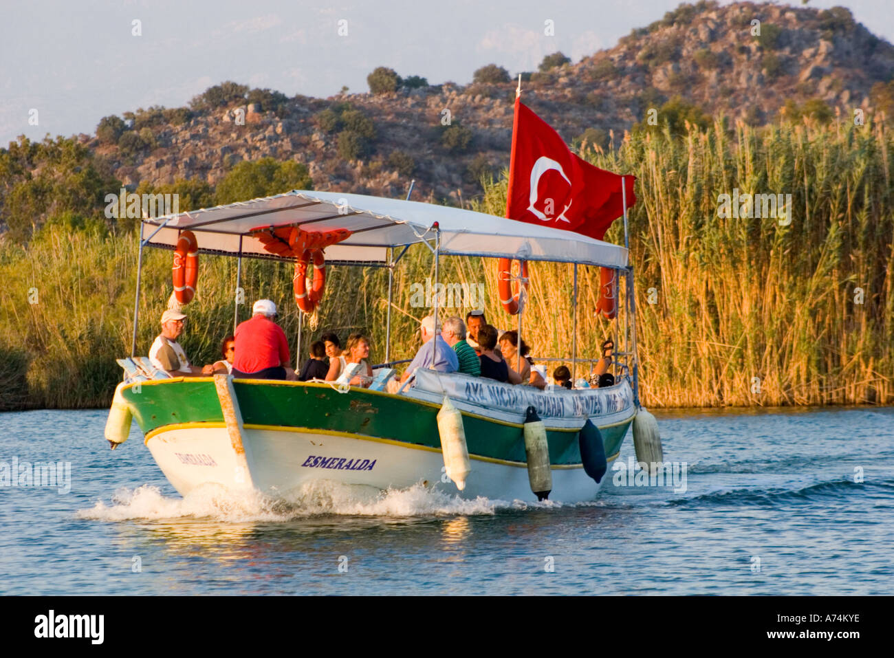 River boat with big Turkey flag at Lake Koycegiz near Daylan Turkey ...
