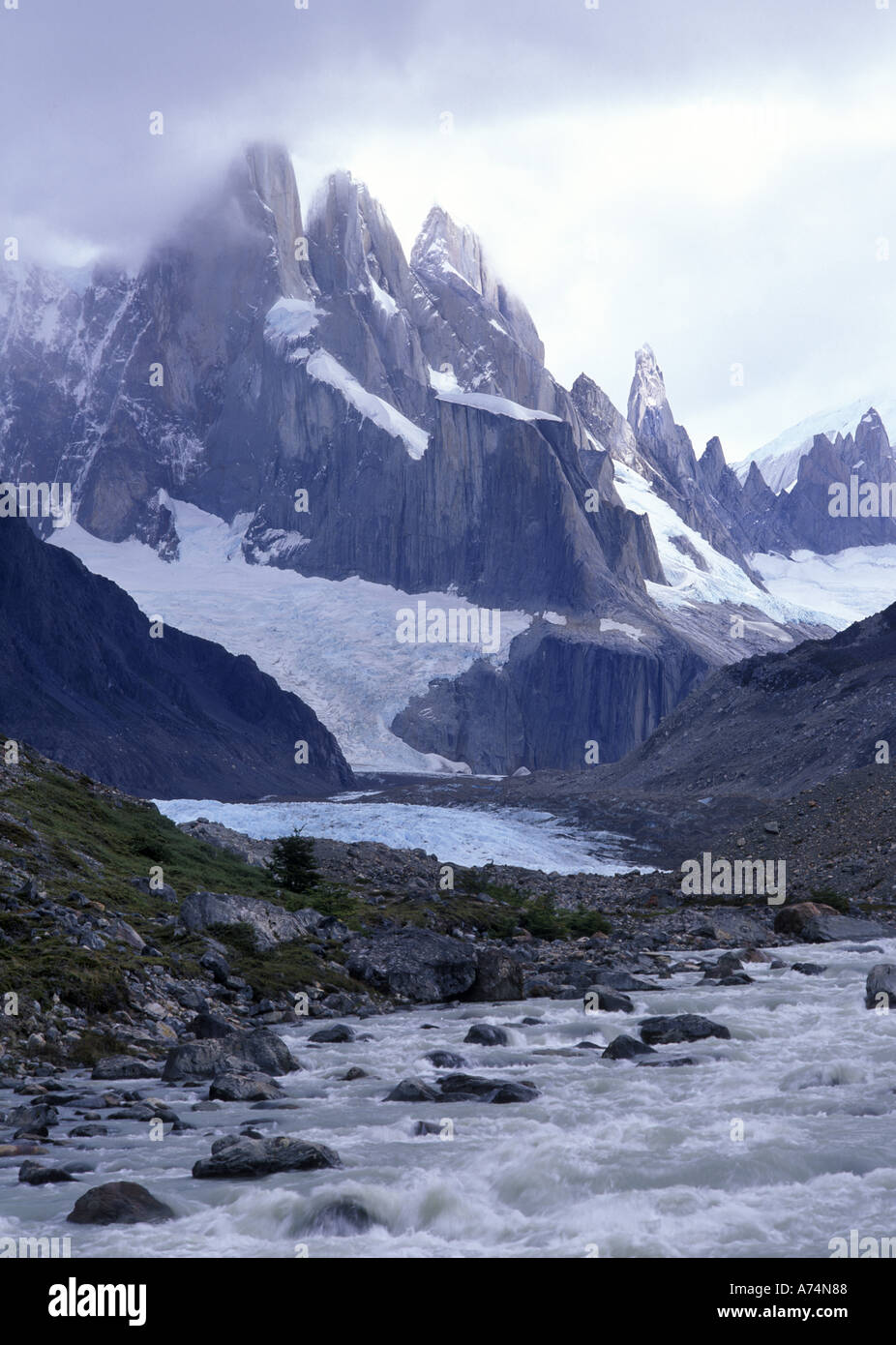 Glacier fed river from the spiked mountains of Cerro Torres National ...