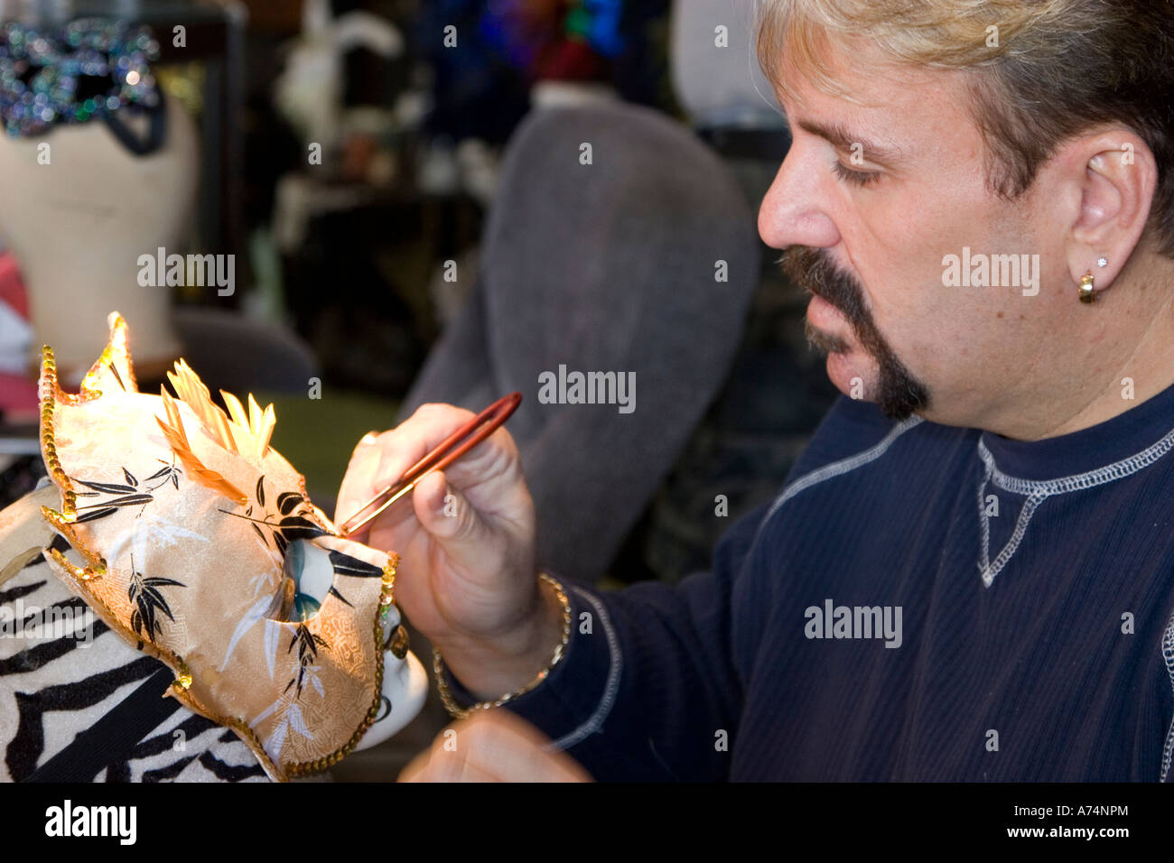 Artist Makes Mask in New Orleans Stock Photo - Alamy