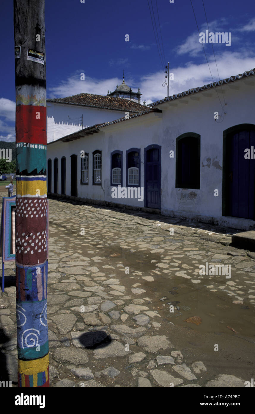 South America, Brazil, Parati. Paved street and painted light pole ...