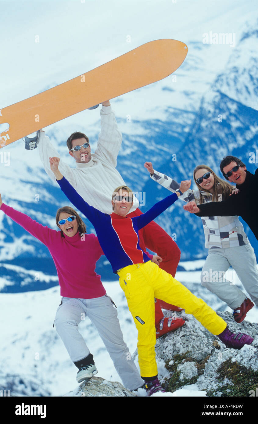 group of friends posing for portrait in winter Stock Photo - Alamy