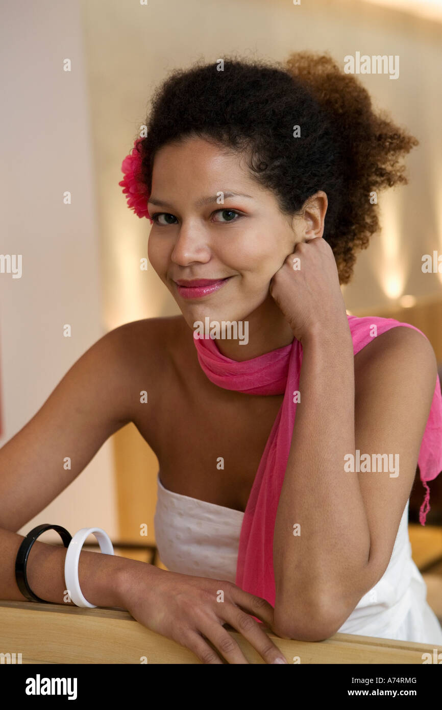 Woman sitting at bar Stock Photo - Alamy